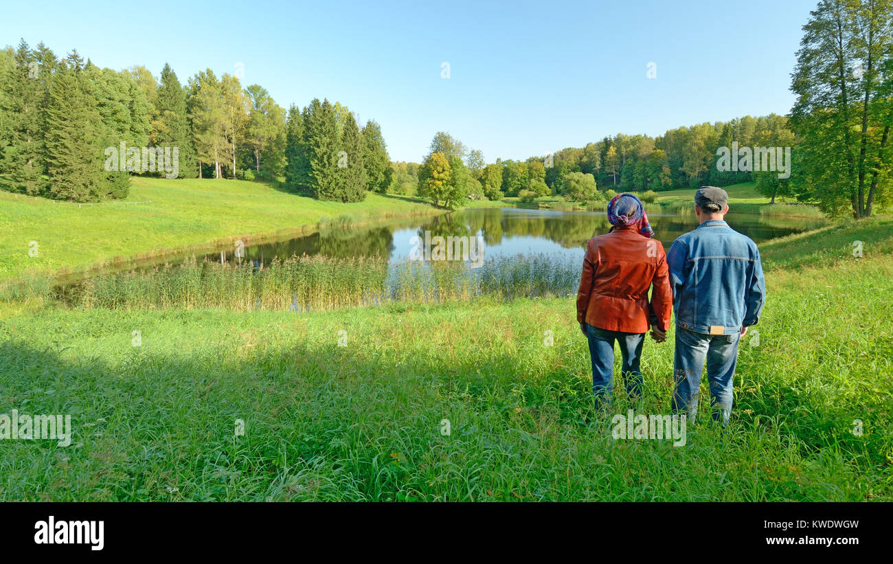 Beautiful scenery in the Park.A man with a woman admiring the nature ...