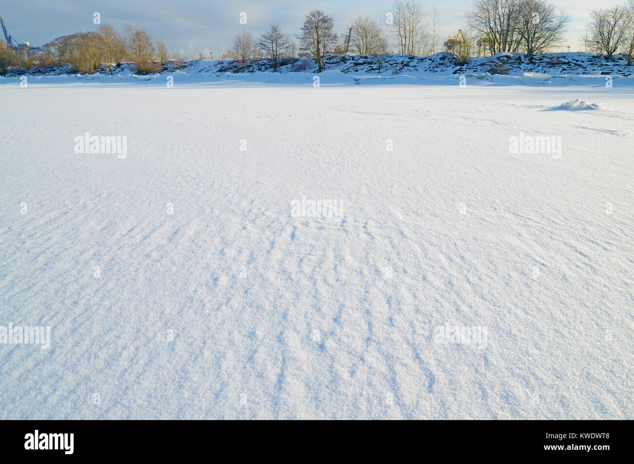 Slanting rays of the sun showing the texture of snow Stock Photo - Alamy