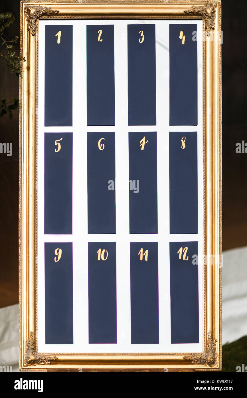 Beautiful elegant stylish wedding guest table list Stock Photo - Alamy