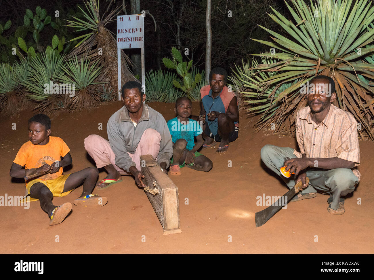Local Malagasy men and boys from the village play traditional music ...