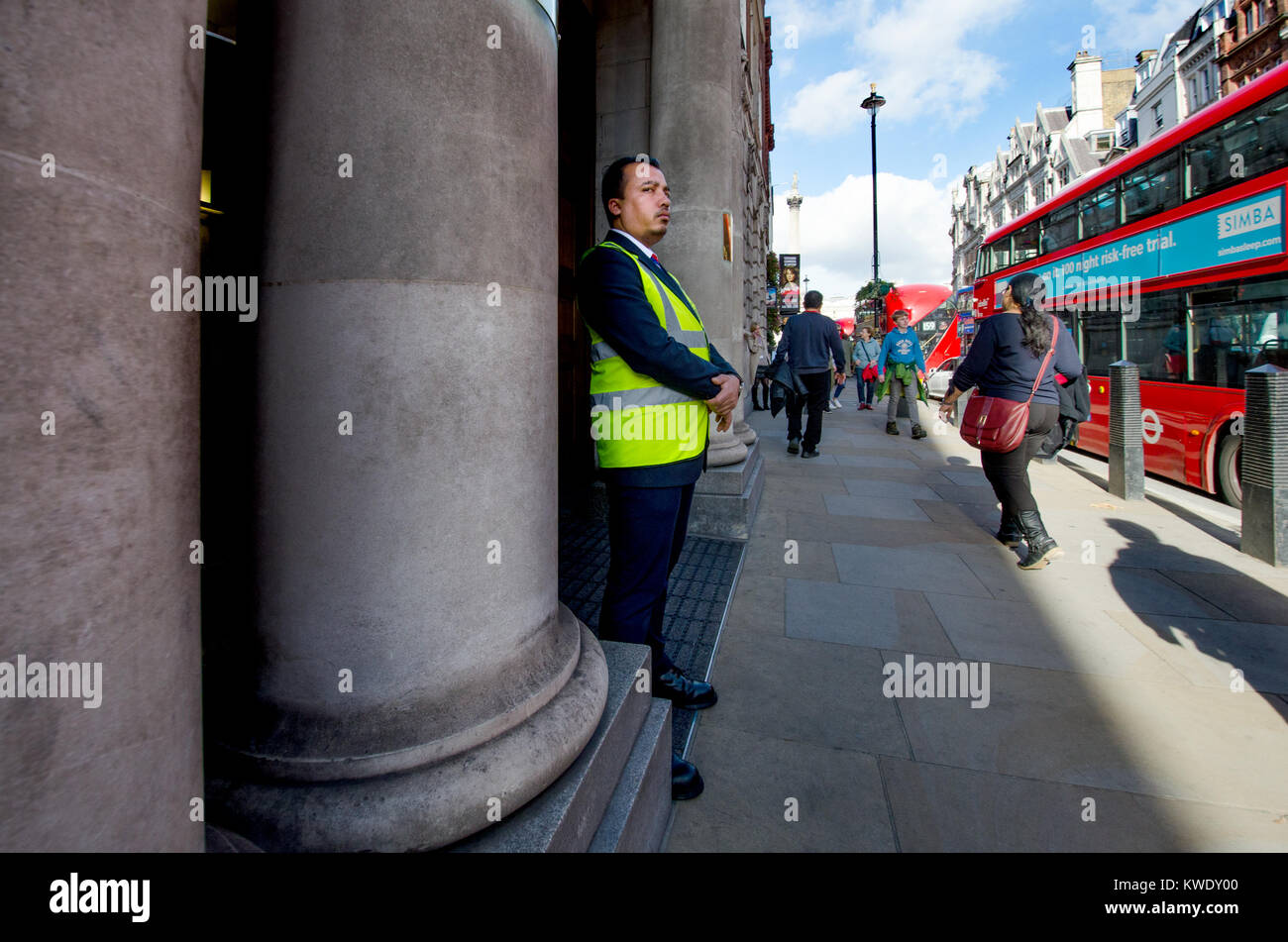 London, England, UK. Security guard at the door of a government ...