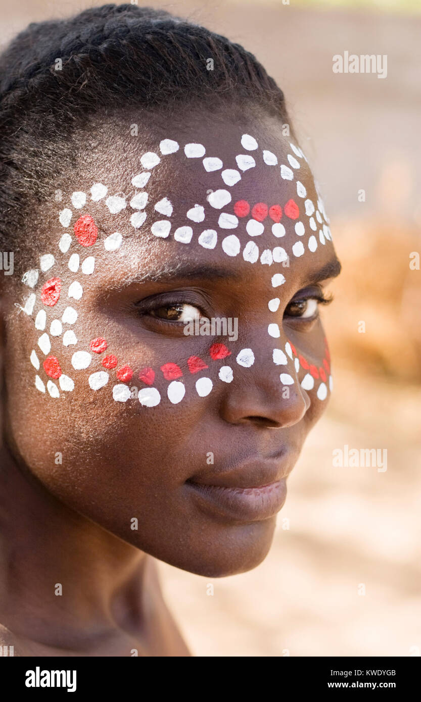 Young African girl with a traditional pained face Stock Photo - Alamy