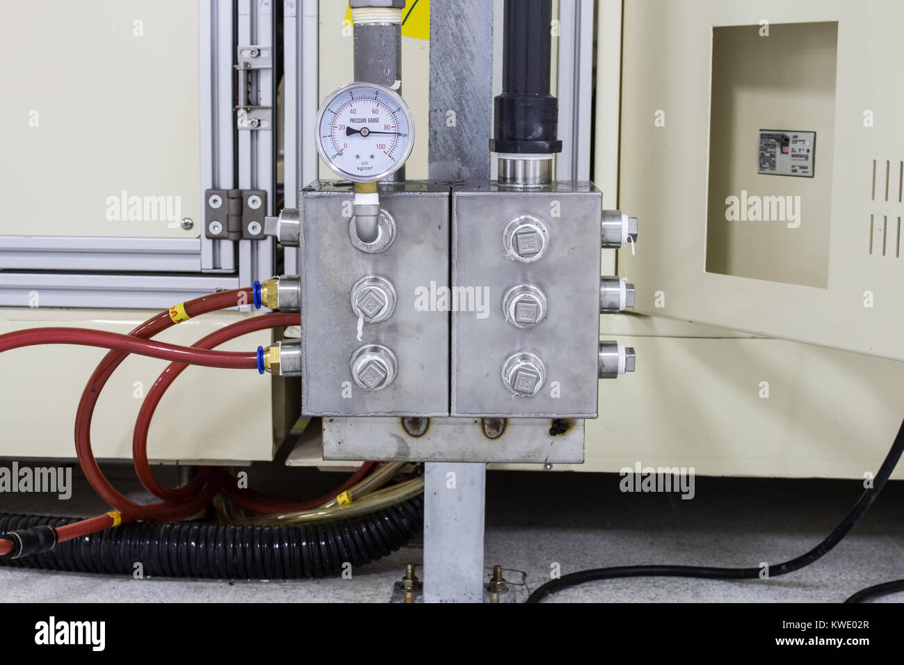 The pressure gauge and pressure joint in pneumatic system Stock Photo ...