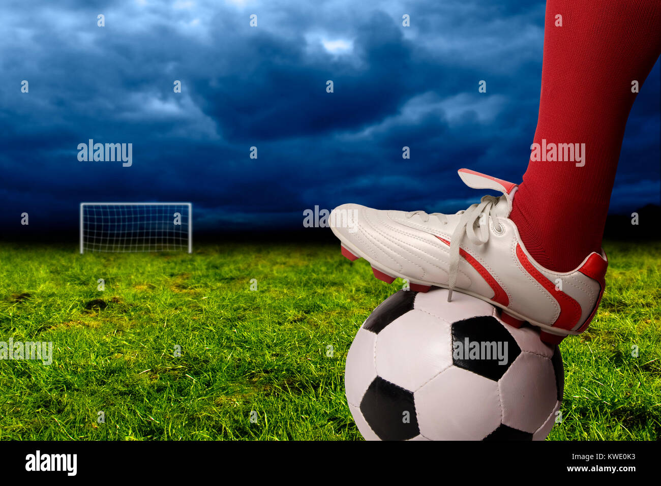 Soccer player legs and ball Stock Photo - Alamy