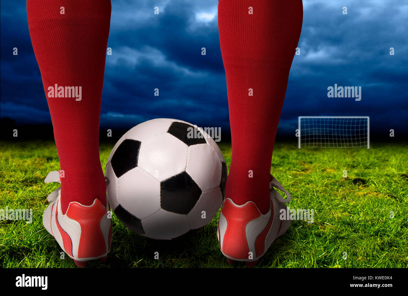 Soccer player legs and ball Stock Photo - Alamy