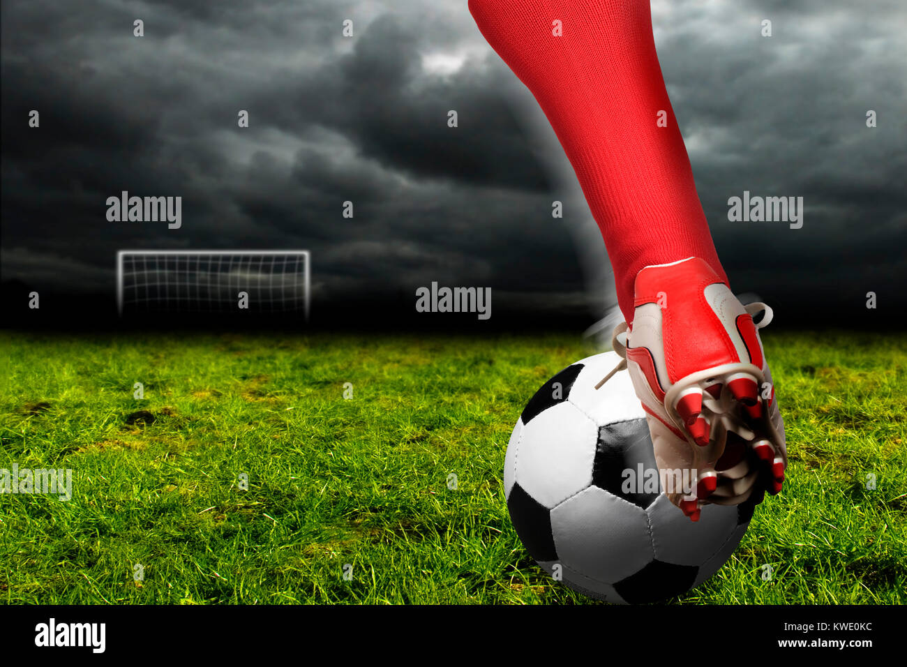 Soccer player legs and ball Stock Photo - Alamy