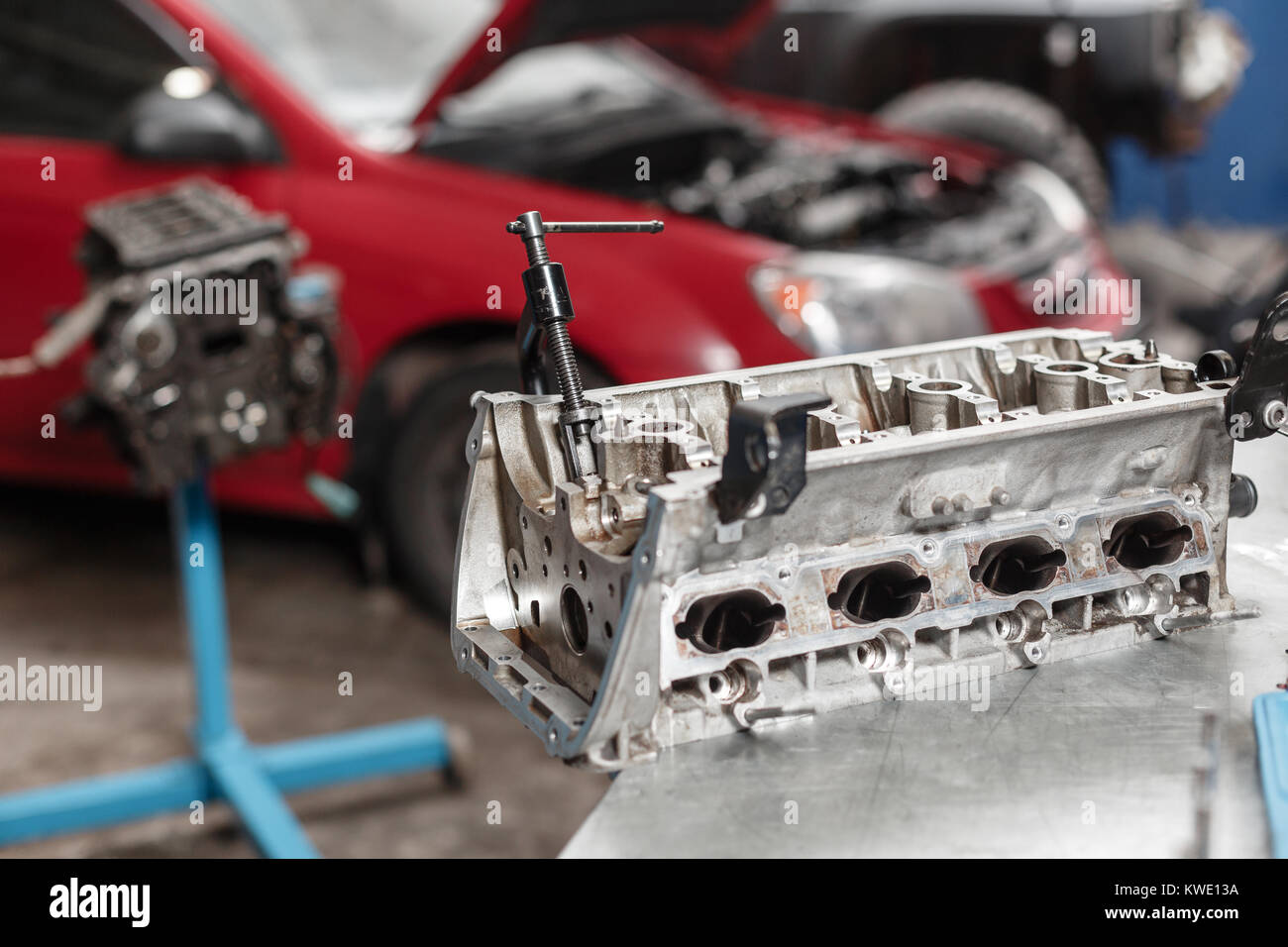Selective focus. Engine Block on a repair stand with Piston and ...