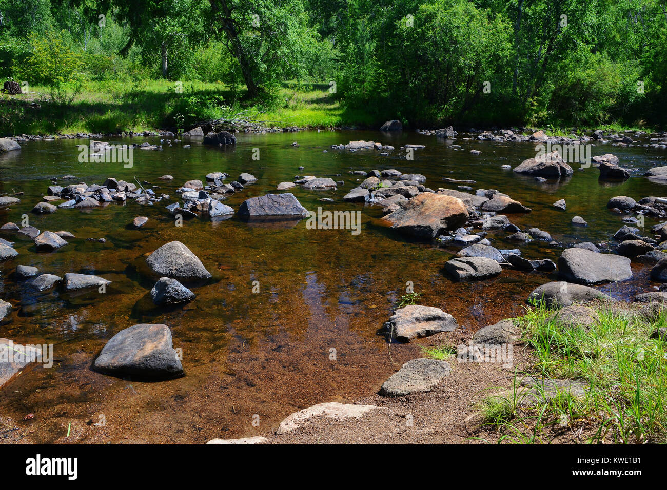 River bottom with stones in transparent water Stock Photo - Alamy