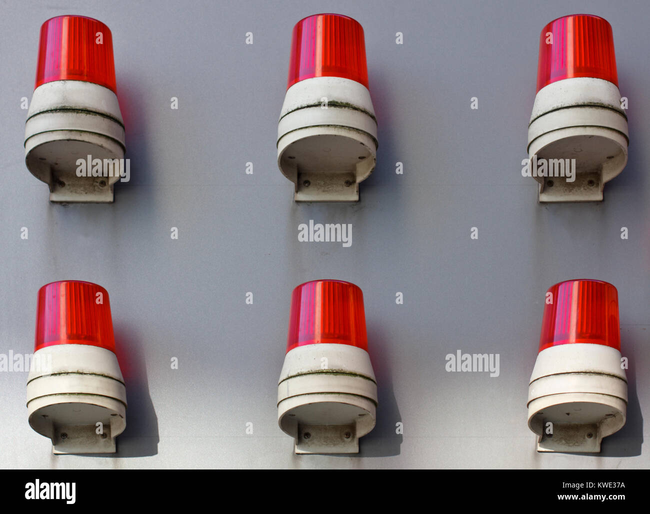 A collection of alarm devices on a wall Stock Photo - Alamy