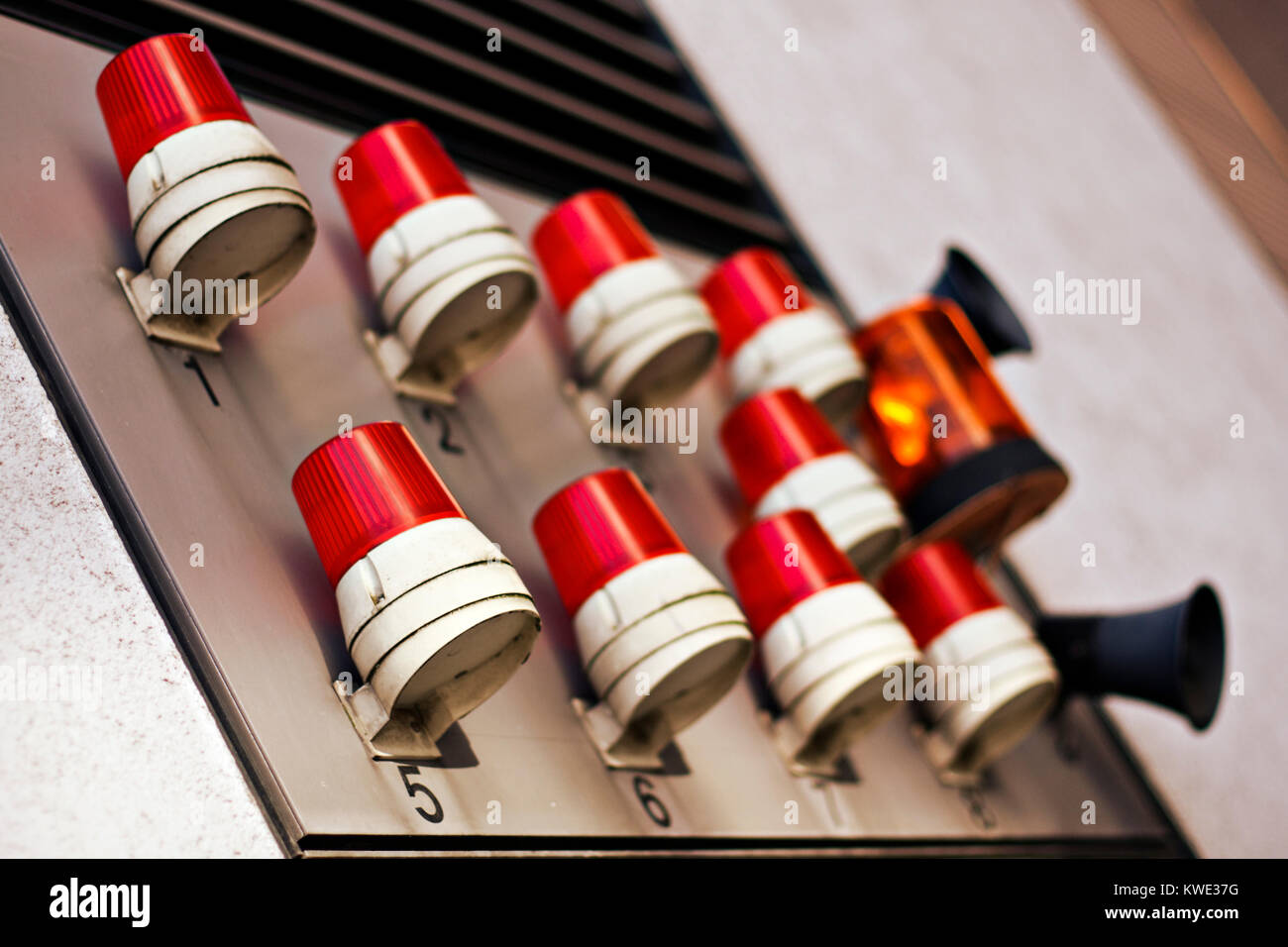 A collection of alarm devices on a wall Stock Photo - Alamy