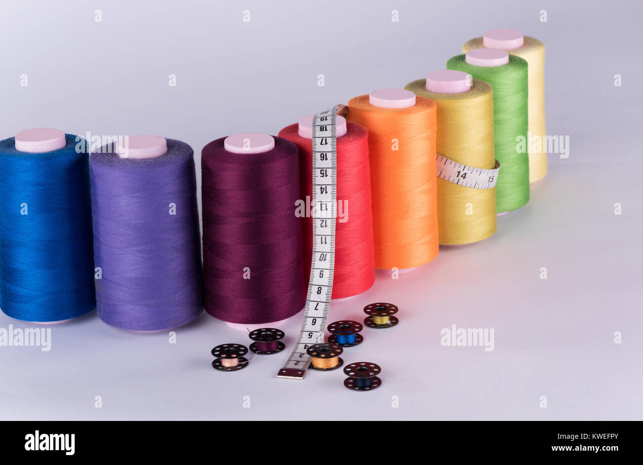 Tailor supplies; yarn coils, mesure and rollers Stock Photo - Alamy
