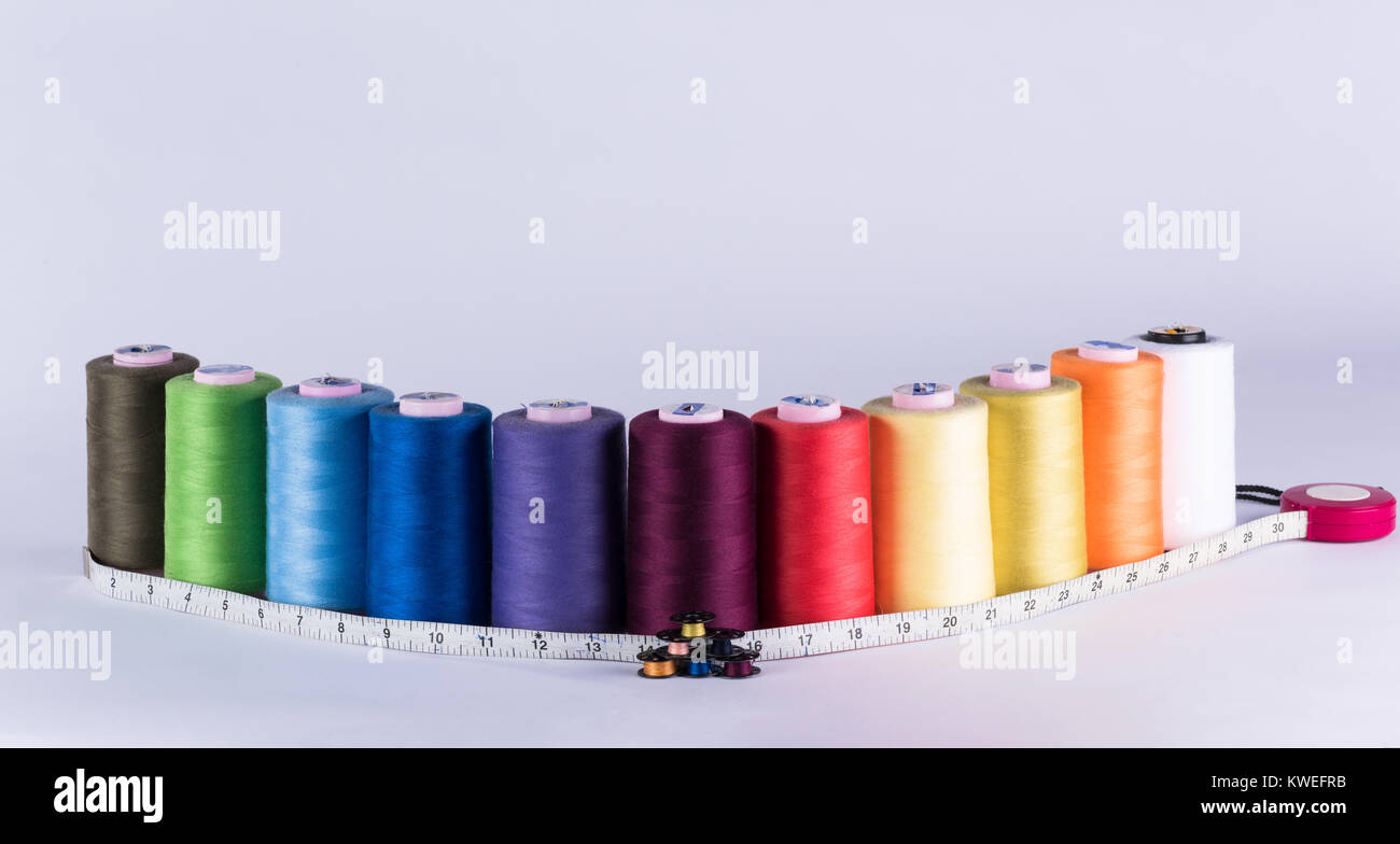 Tailor supplies; yarn coils, mesure and rollers Stock Photo - Alamy
