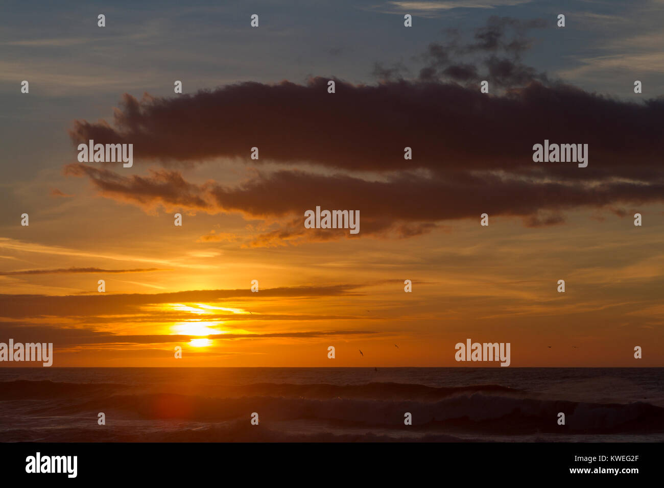 Beautiful sunset in the sea Stock Photo - Alamy