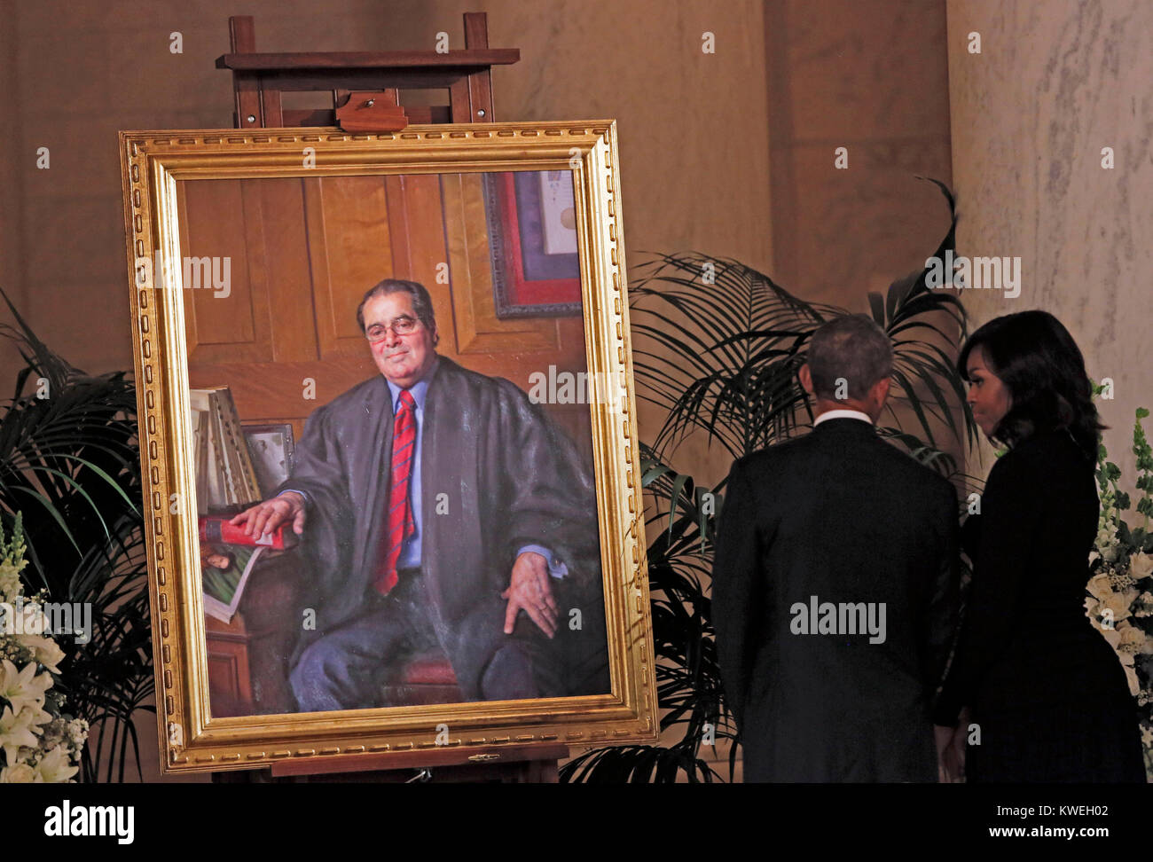 United States President Barack Obama and First Lady Michelle Obama look ...
