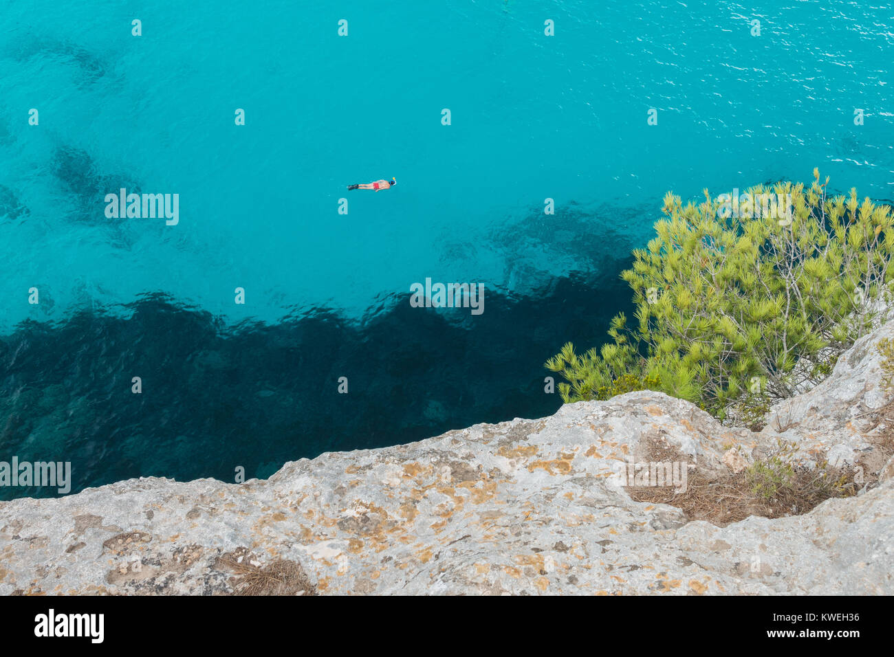 Scuba diving in blue water Stock Photo - Alamy