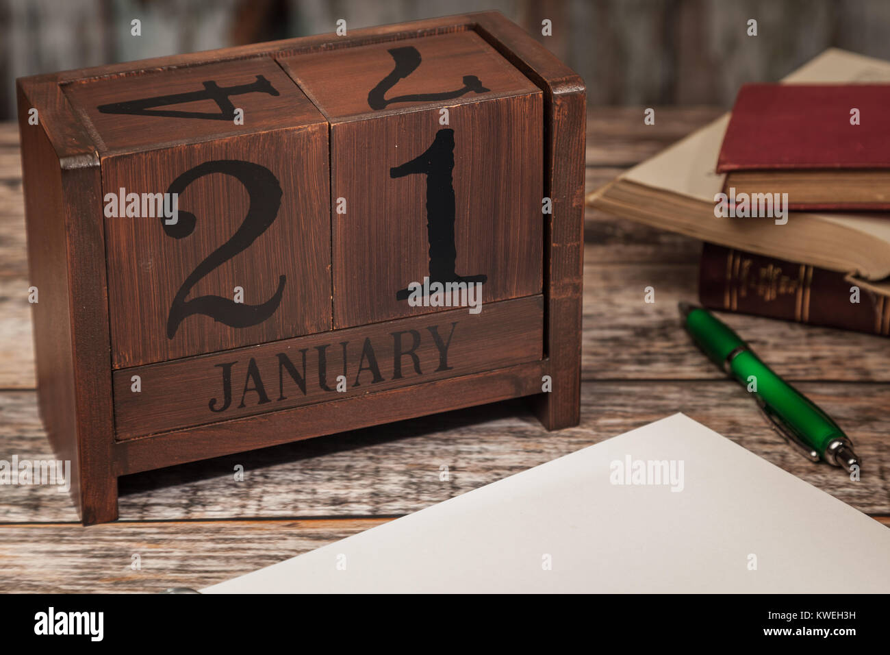 Perpetual Calendar in desk scene with blank diary page, January 21st ...