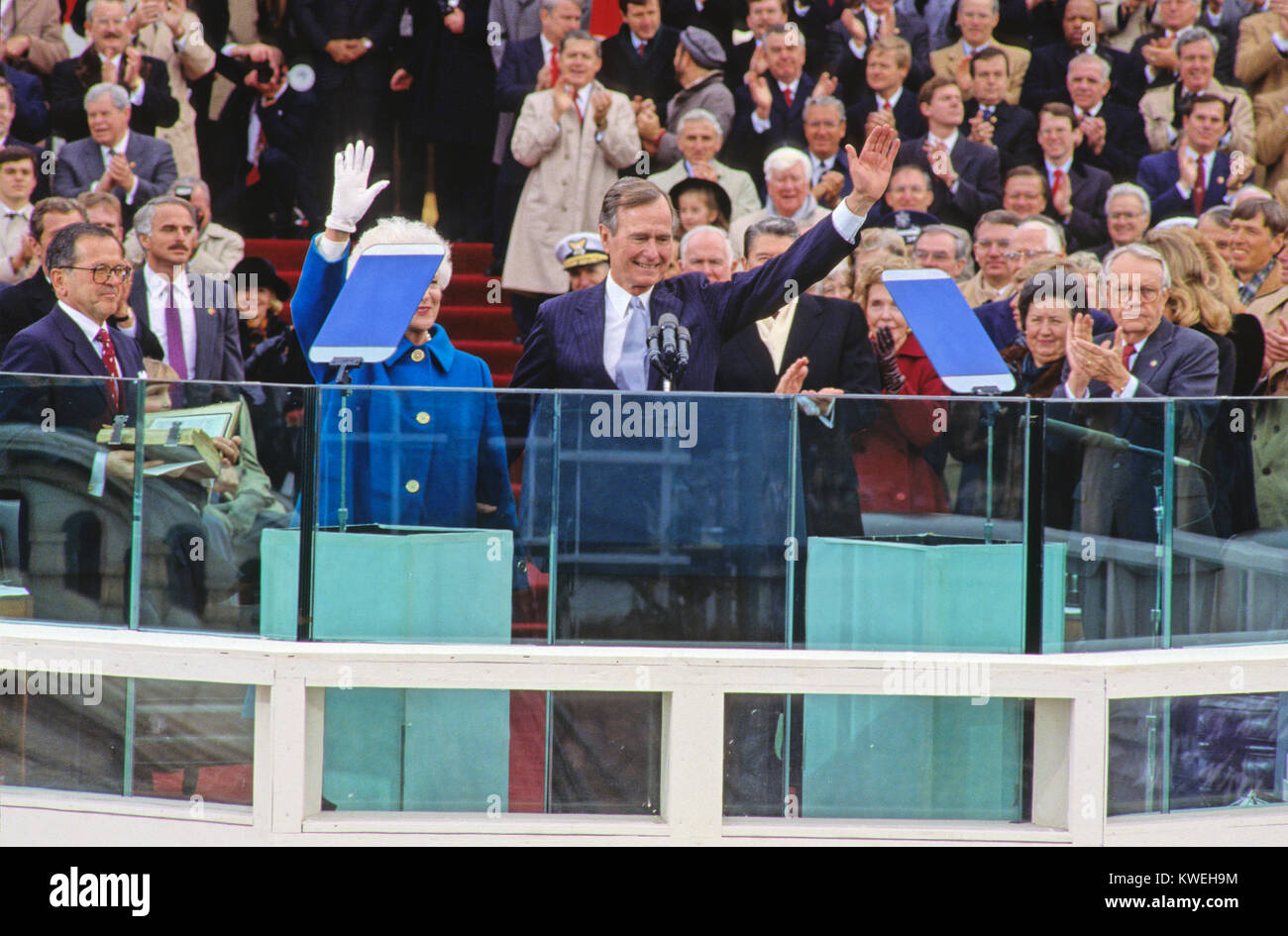 United States President George H.W. Bush waves as he delivers his ...