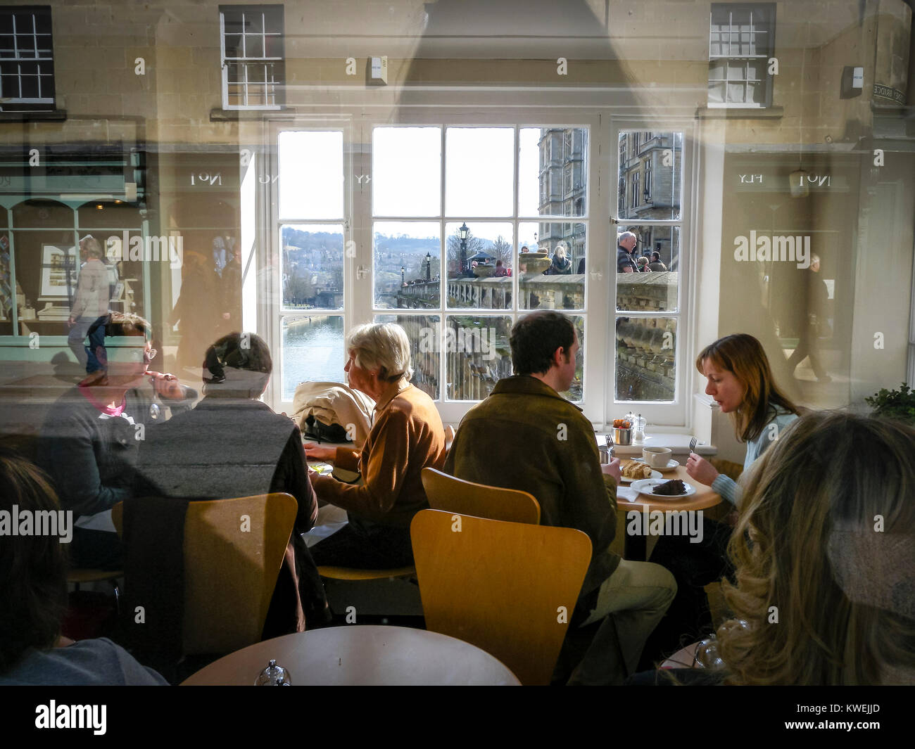 View through a window of a cafe on Pulteney Bridge in the city of Bath ...
