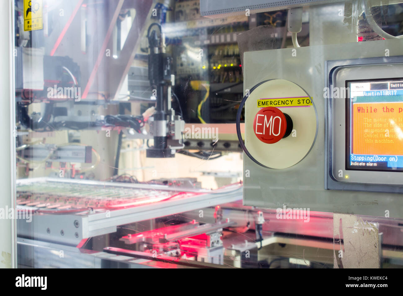 The Emergency stop button on auto machine Stock Photo - Alamy