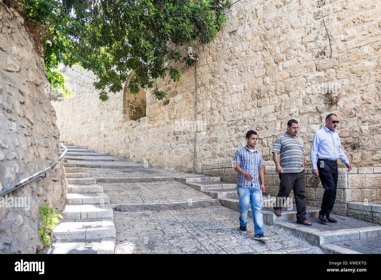palestinian people in old town cobbled street scene of jerusalem city ...
