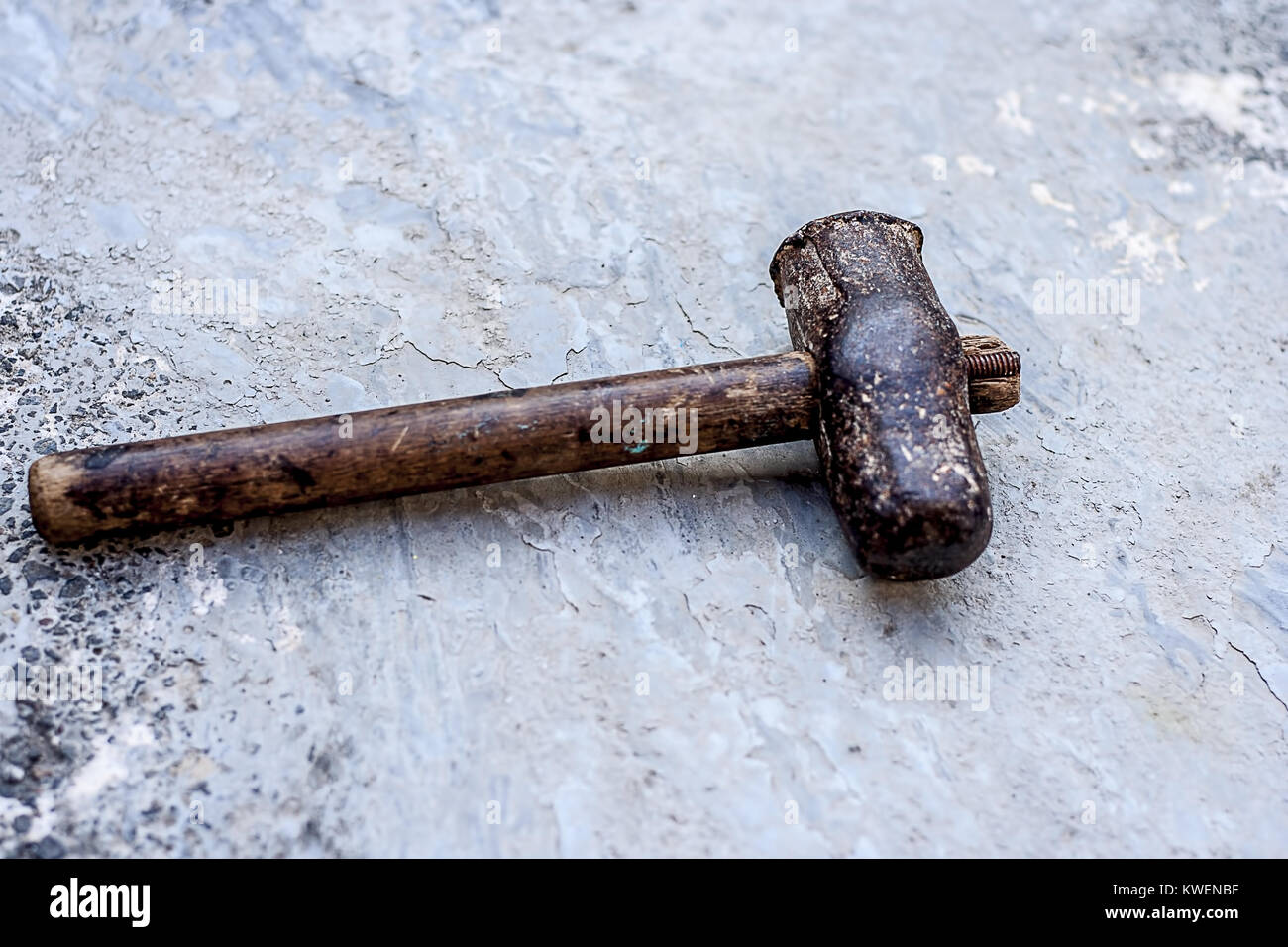 A old rusted hammer on rough surface Stock Photo - Alamy