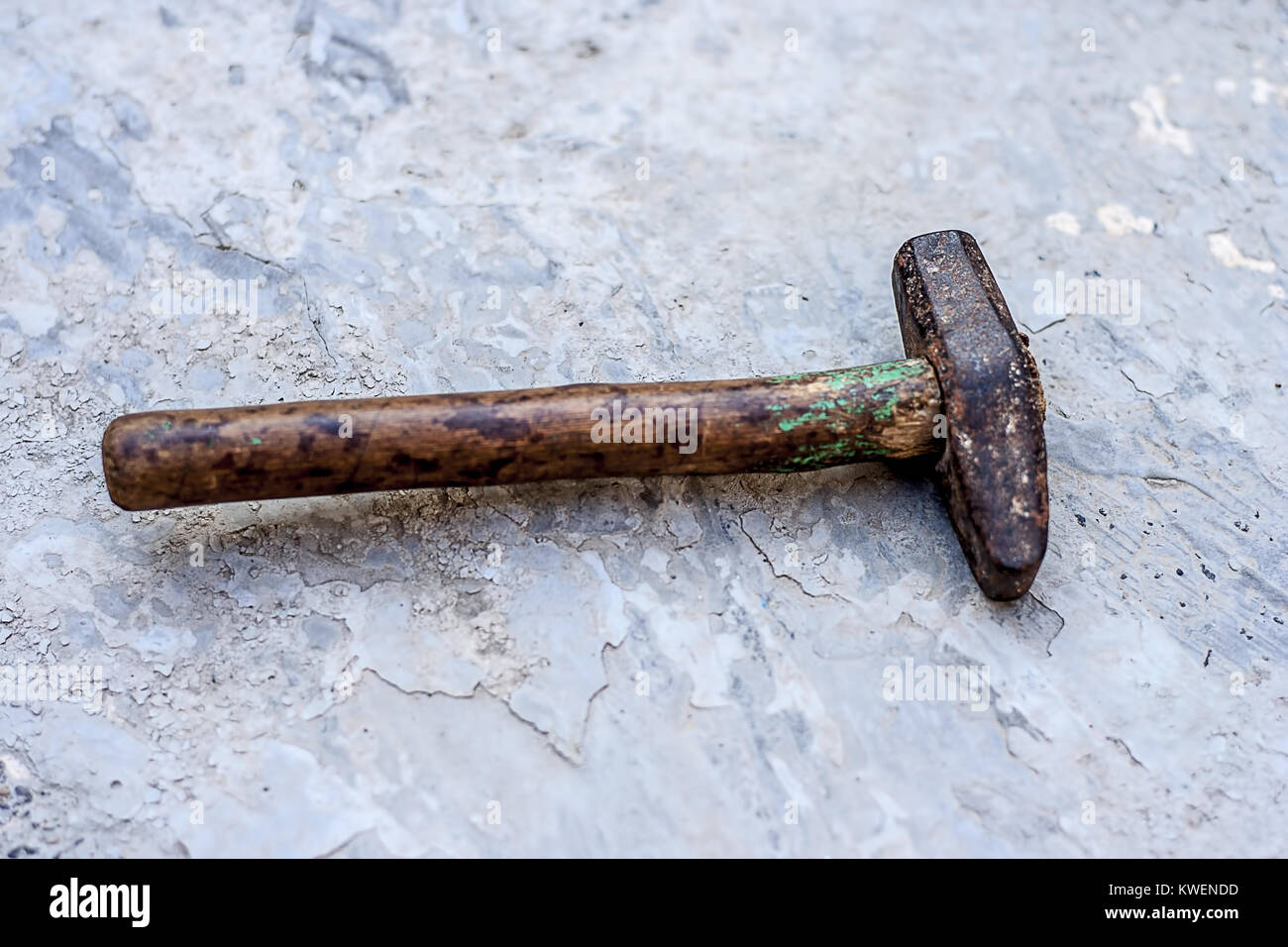 A old rusted hammer on rough surface Stock Photo - Alamy