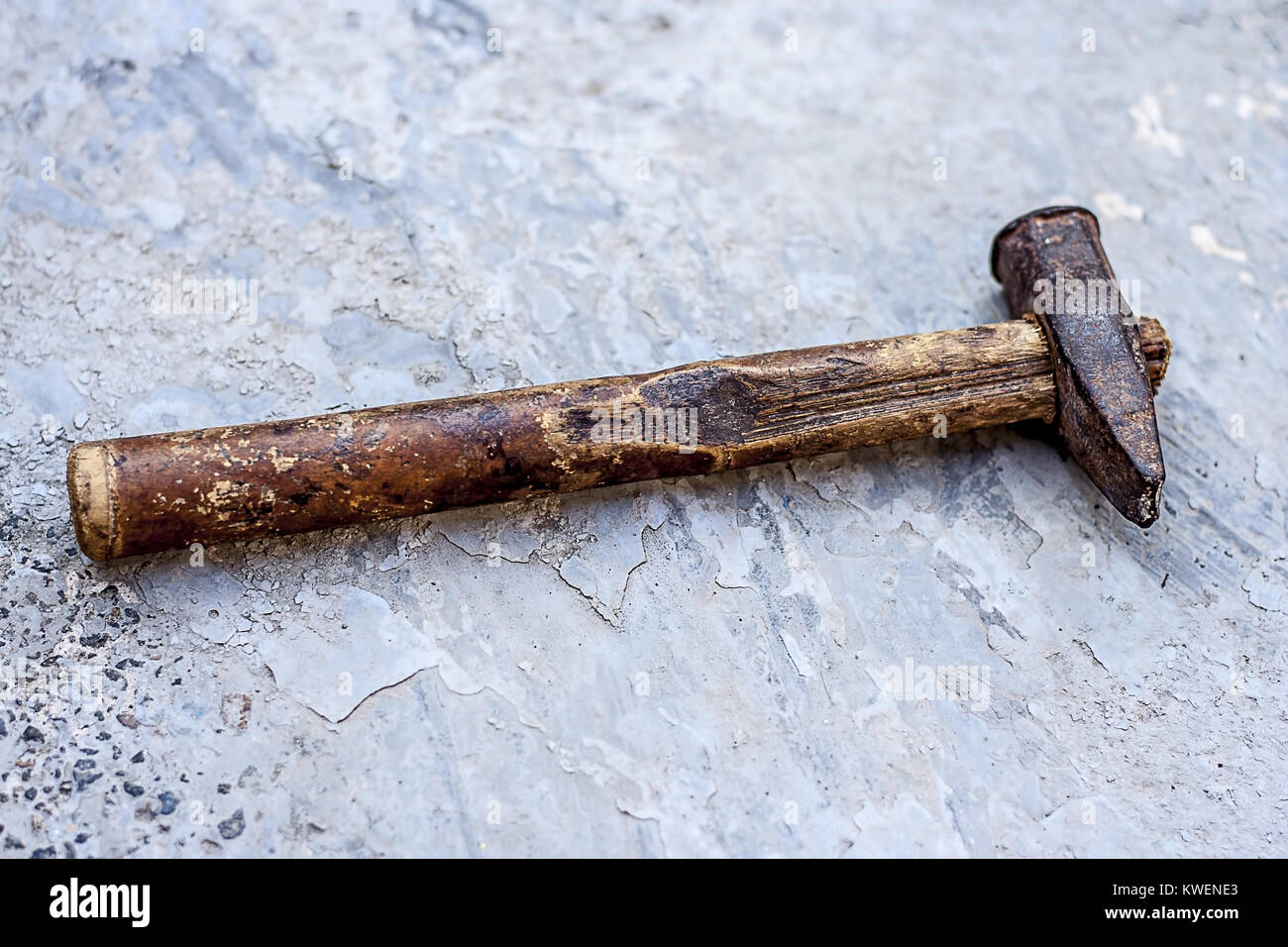 A old rusted hammer on rough surface Stock Photo - Alamy