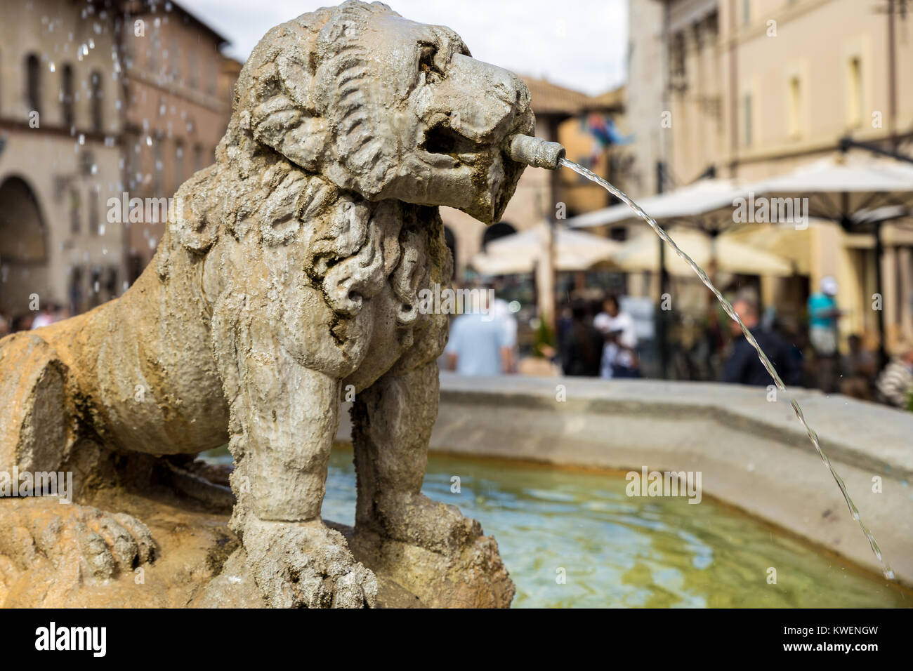detail of an ancient fountain of an Italian medieval city Stock Photo ...