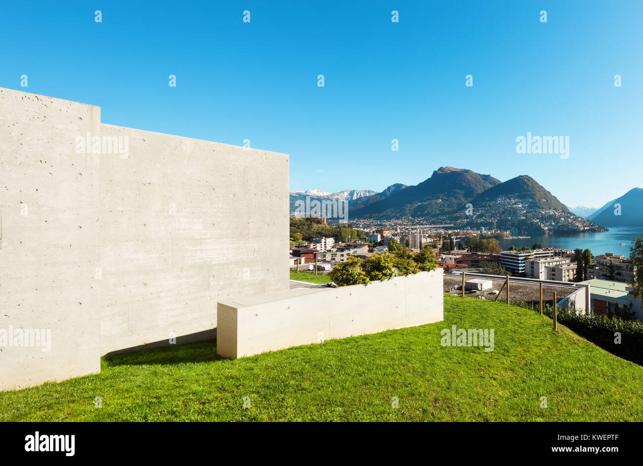 Beautiful modern house in cement, side view Stock Photo - Alamy