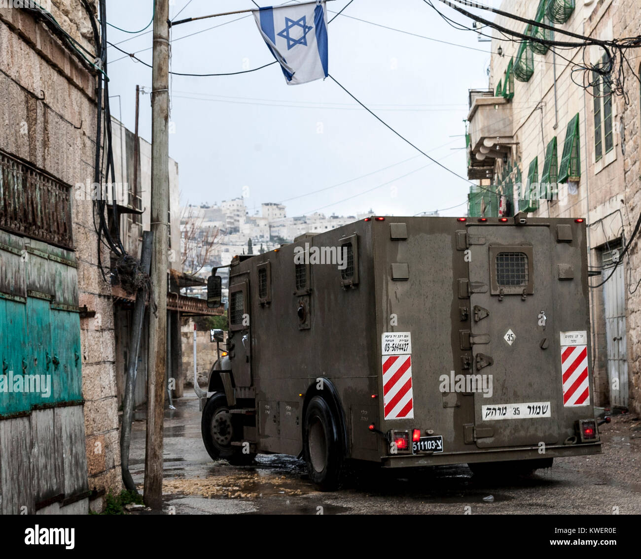Hebron, Palestine, January 8 2011: Israeli military car patroling ...