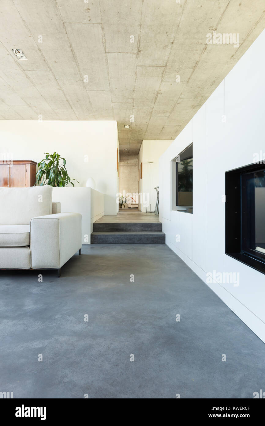 beautiful modern house in cement, interiors, view from the living room ...