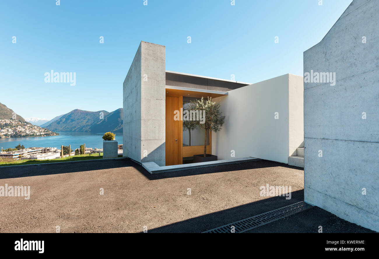 beautiful modern house in cement, outdoor, entry view Stock Photo - Alamy