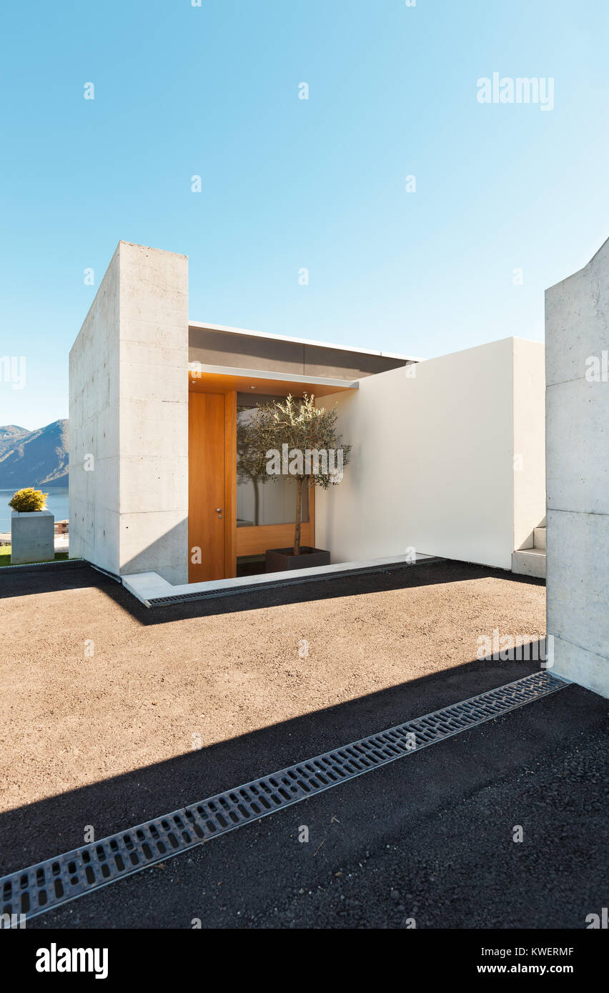 beautiful modern house in cement, outdoor, entry view Stock Photo - Alamy