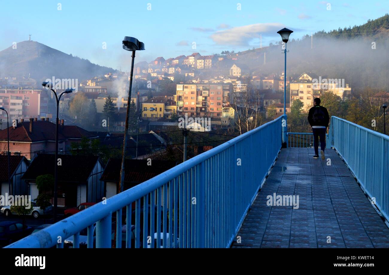 a young man on a pedestrian bridge Stock Photo - Alamy