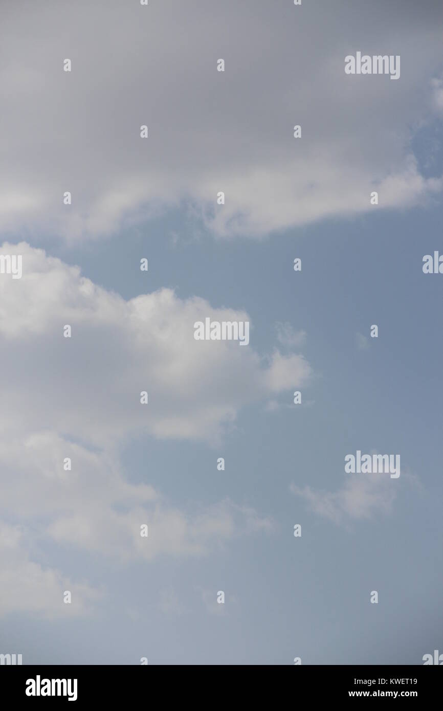 Clear blue daylight sky with white clouds and sunlight. Natural ...
