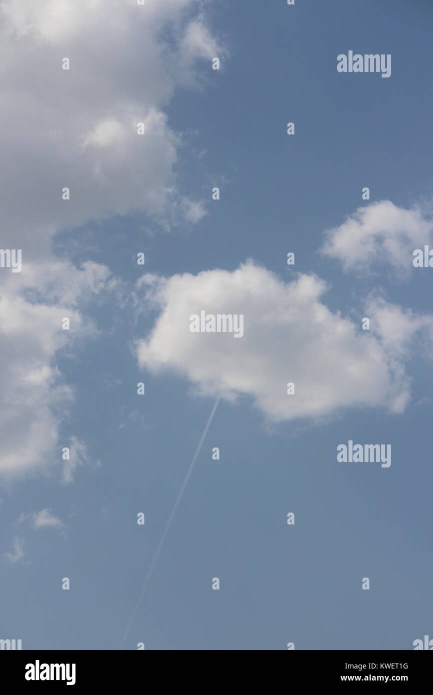 Clear blue daylight sky with white clouds and sunlight. Natural ...