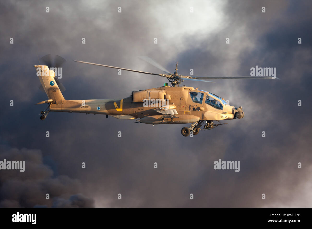 AH-64 Apache attack helicopter fly above Hatzerim Air Force base near ...