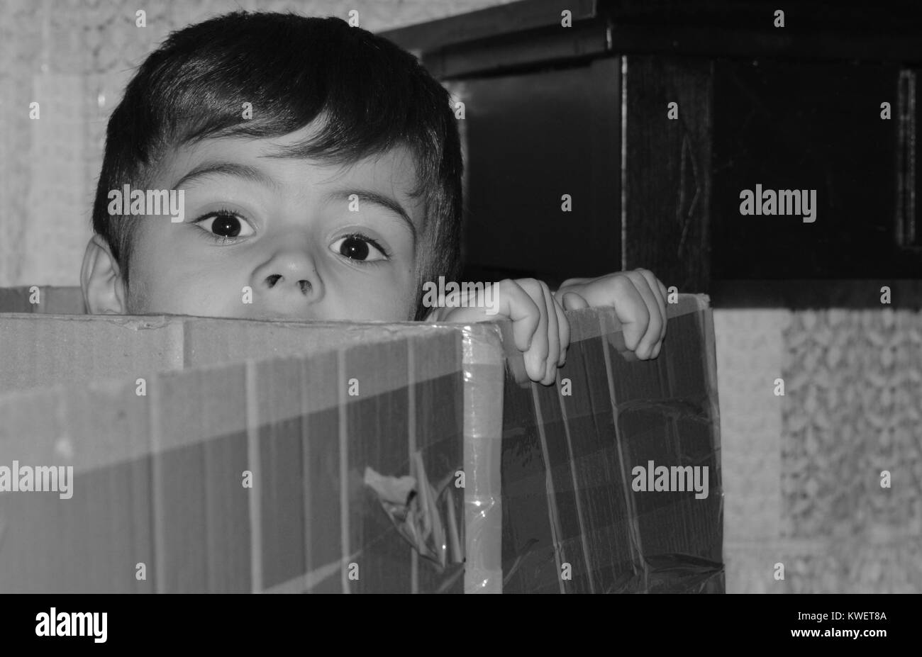 boy in a box Stock Photo - Alamy