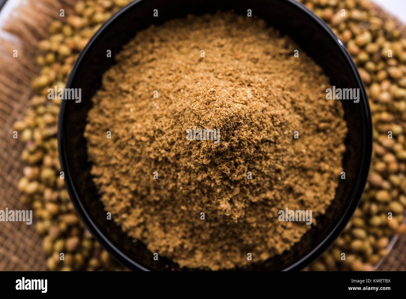 Indian spice coriander powder heap, selective focus Stock Photo - Alamy