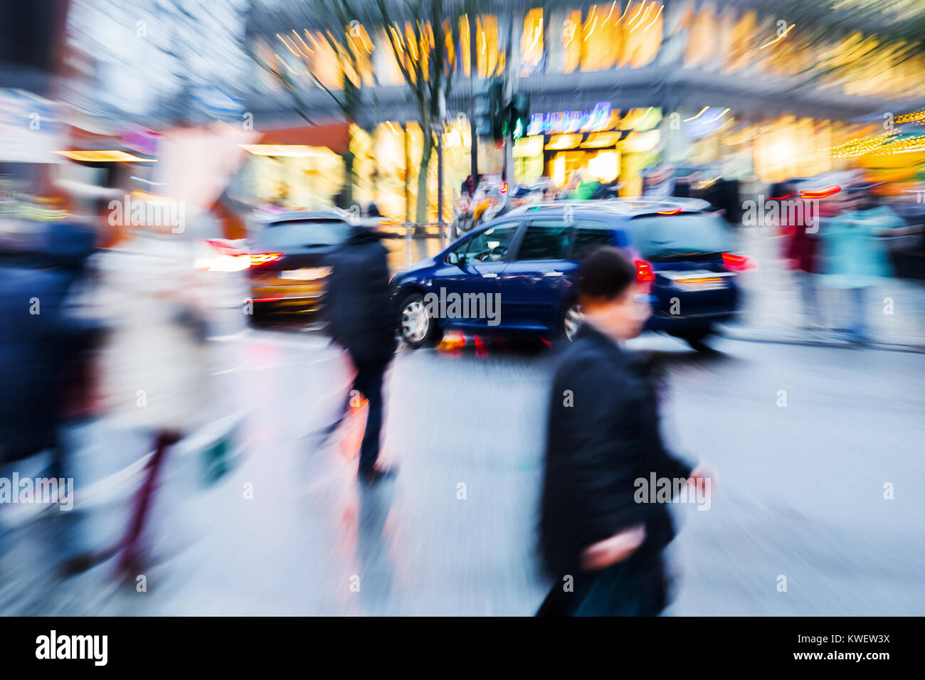 picture with camera made zoom effect of a street scene in the city at ...