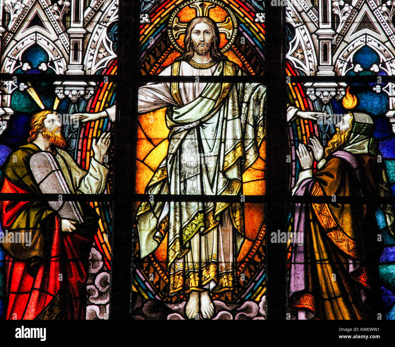 Stained glass window depicting Jesus Christ, Moses with the Ten ...