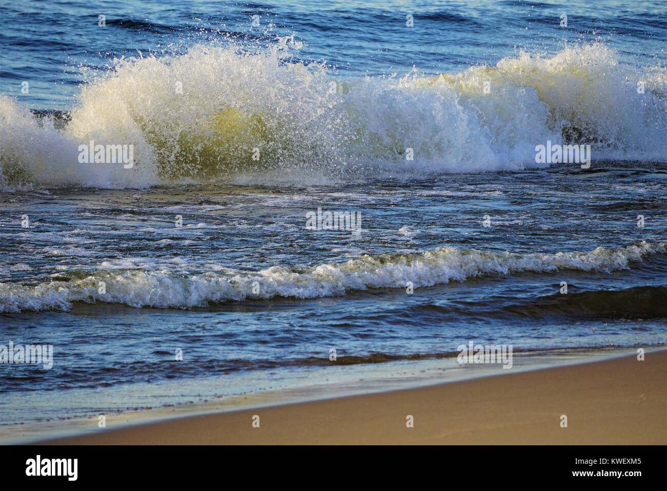Waves at the Beach in Autumn Stock Photo - Alamy
