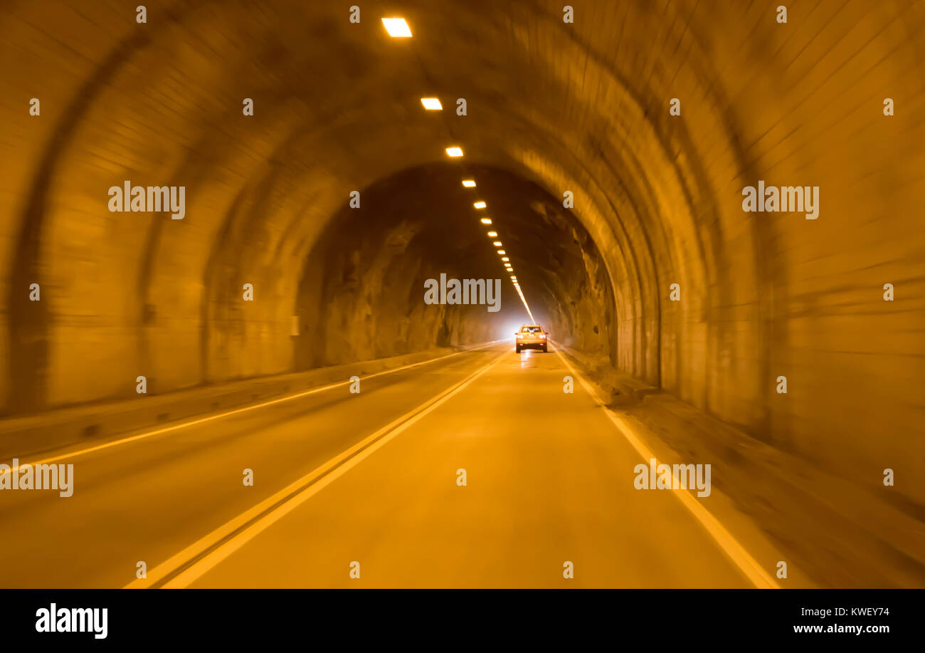 Car Drives Through Long Tunnel Stock Photo - Alamy