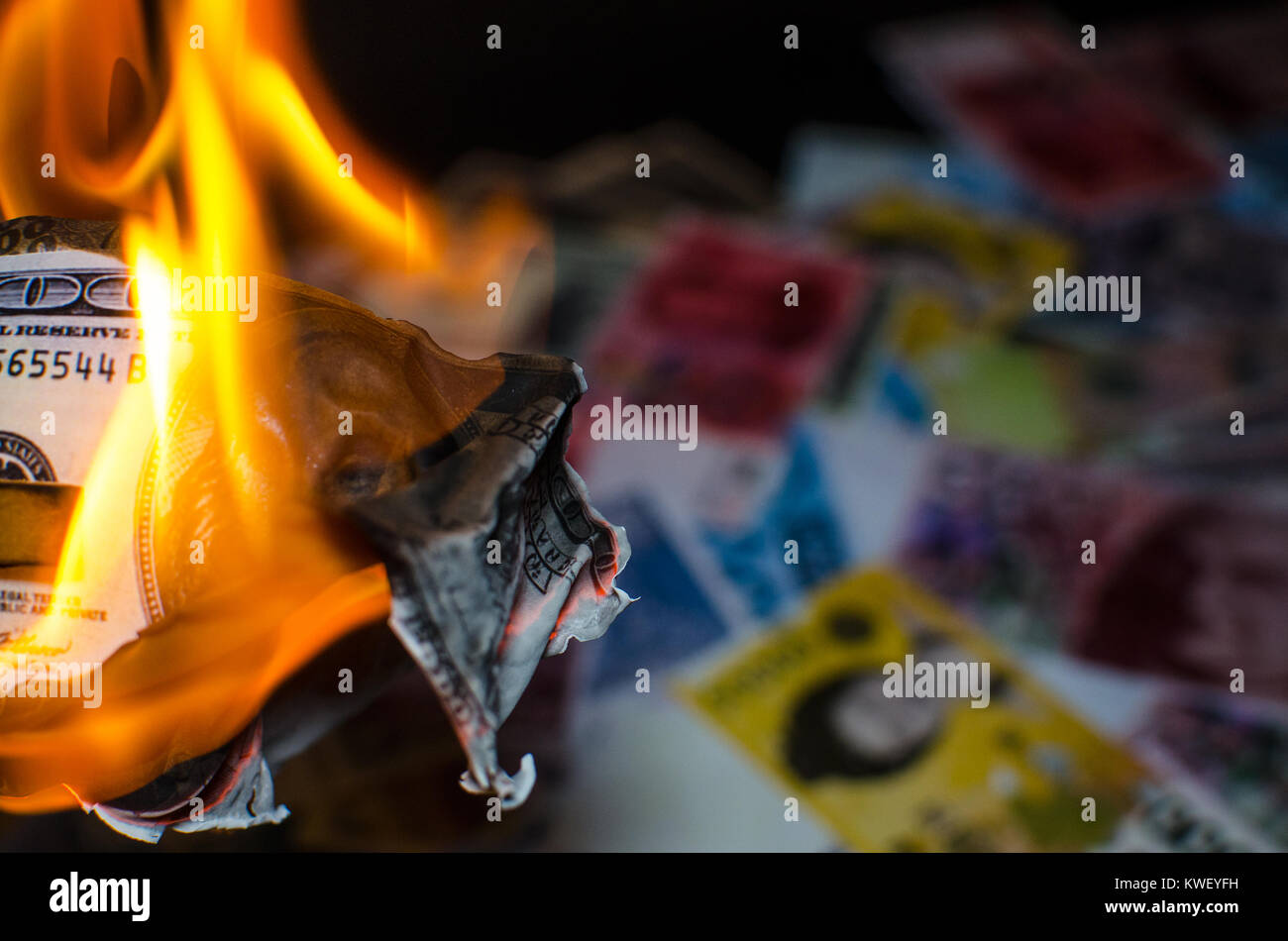 A one dollar bill in American US currency is on fire Stock Photo - Alamy