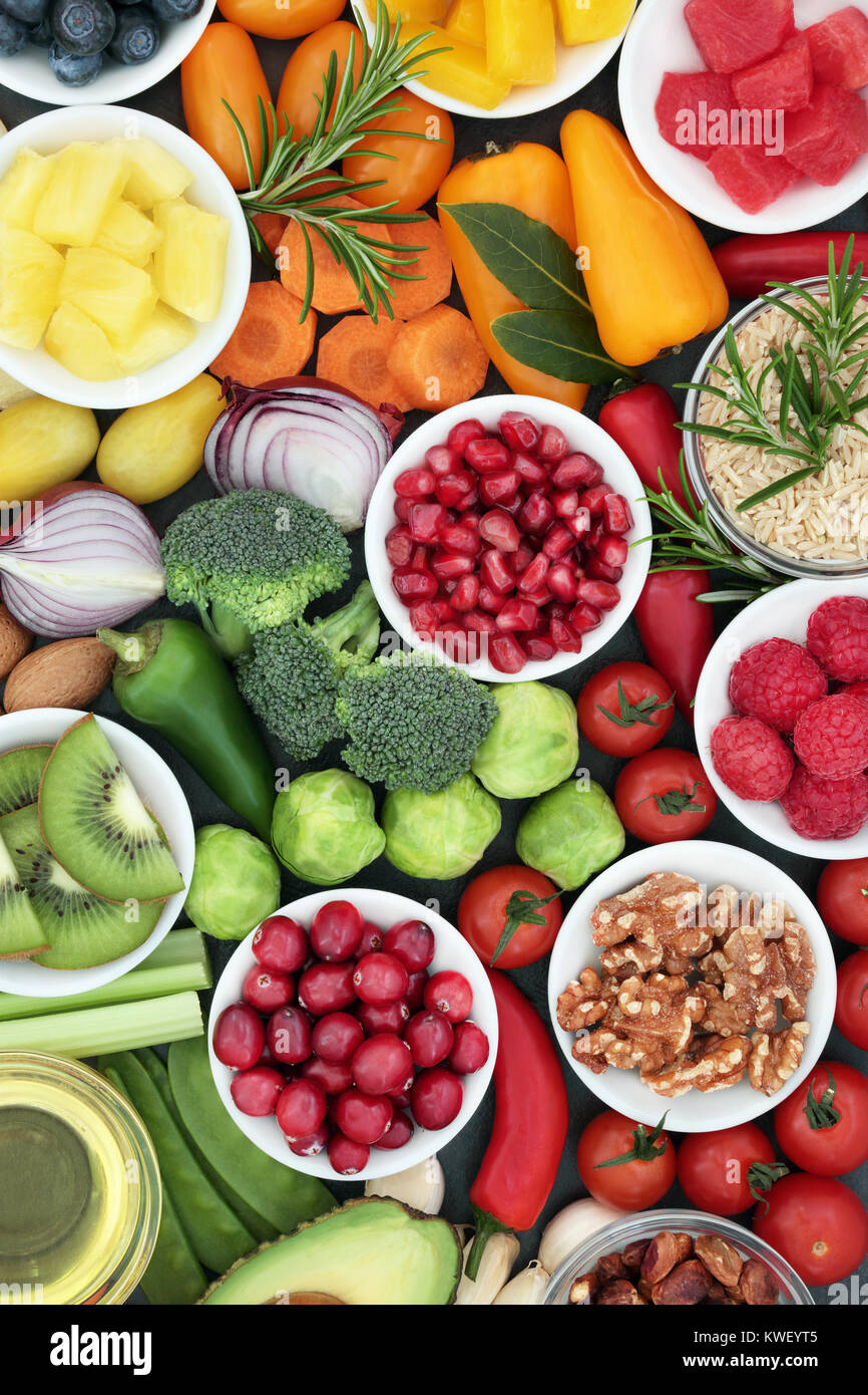 Healthy lifestyle food concept with fresh vegetables, fruit, herbs ...