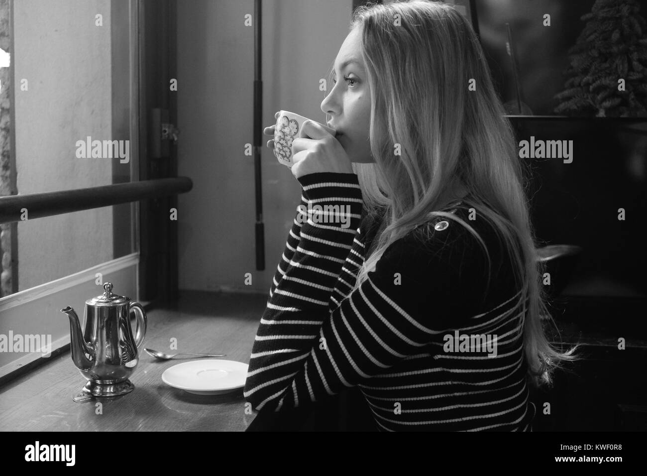 girl young enjoying hot tea Stock Photo - Alamy