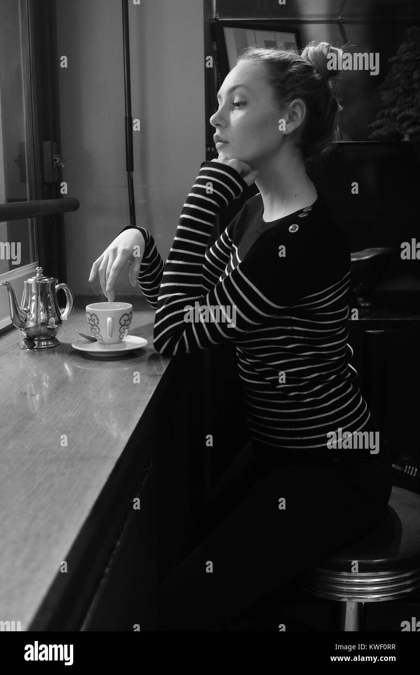 girl young enjoying hot tea Stock Photo - Alamy