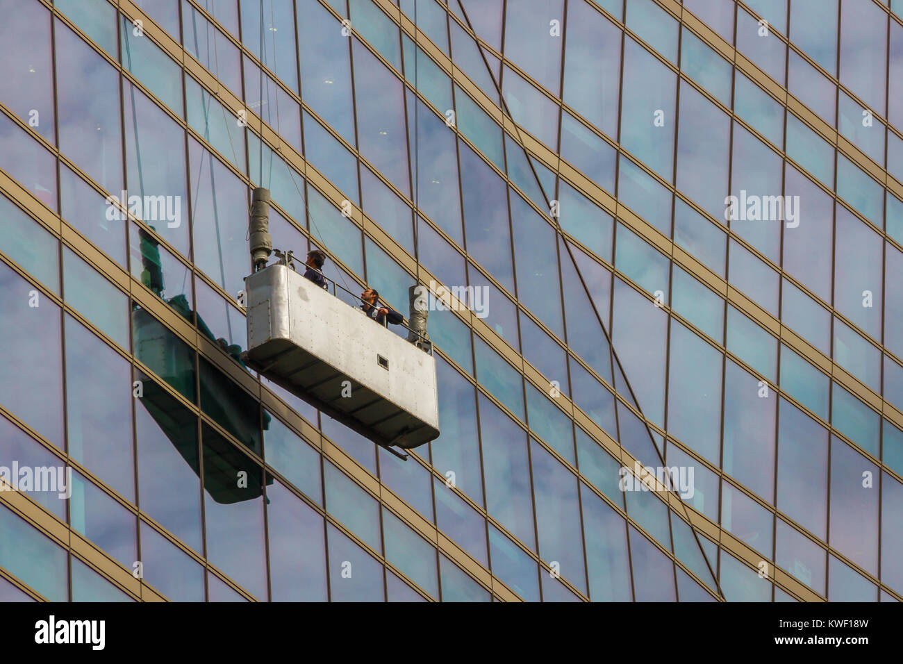 Window cleaners on a high-rise building Stock Photo - Alamy