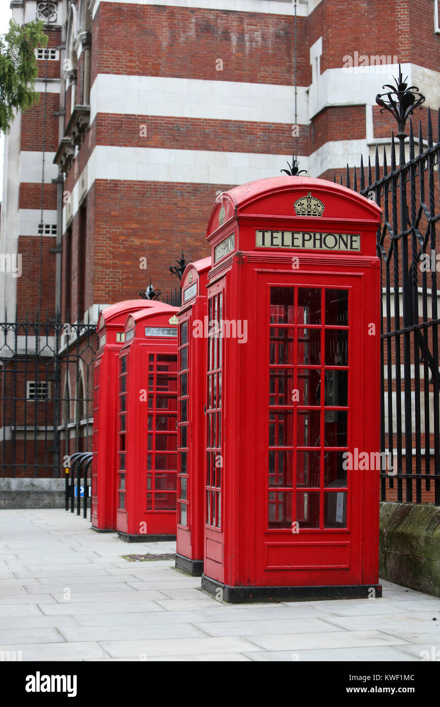 Classic old red telephone boxes pictured on a street in London, UK ...