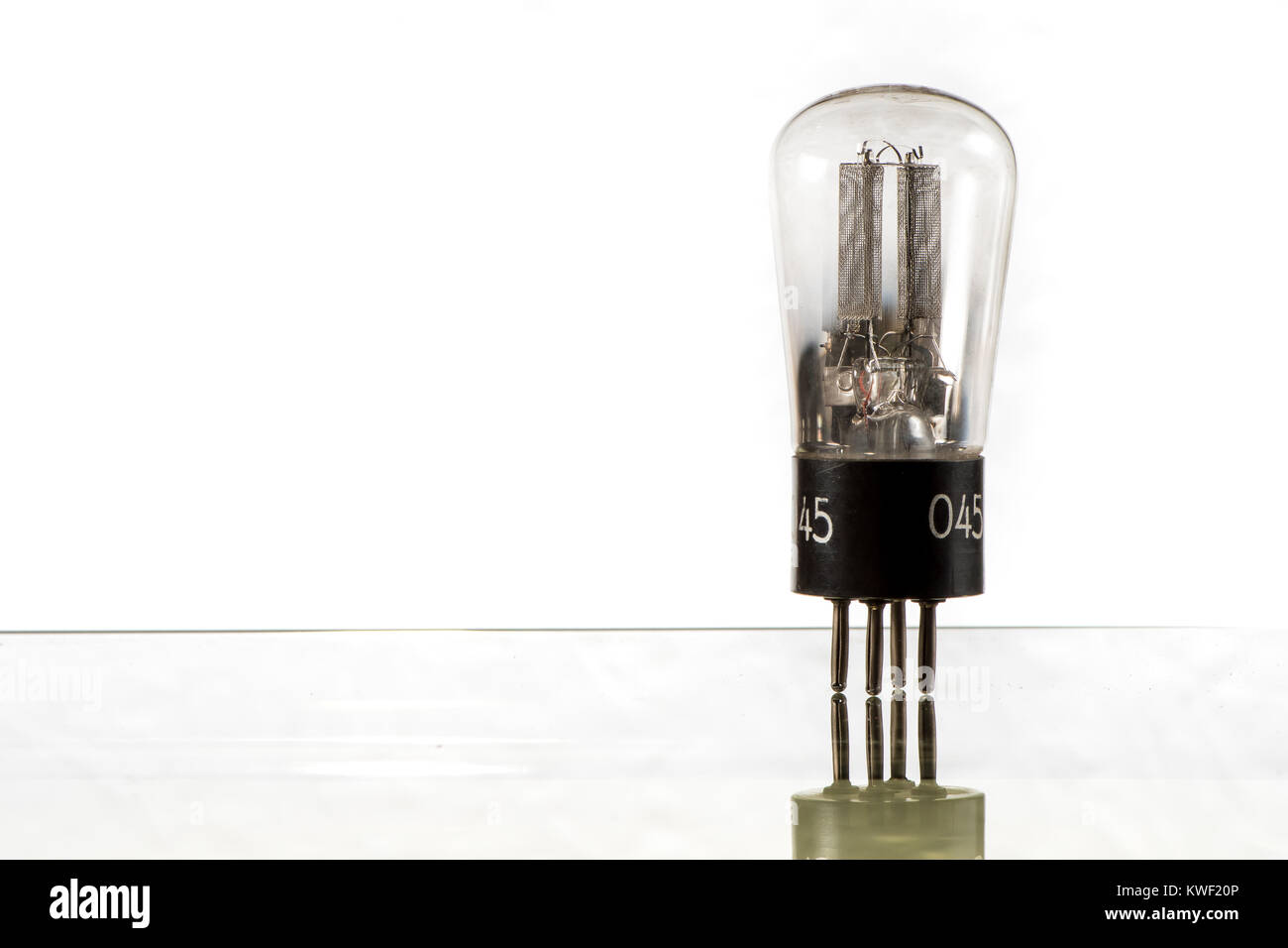 Closeup of an old electronic vacuum tube, white background Stock Photo ...